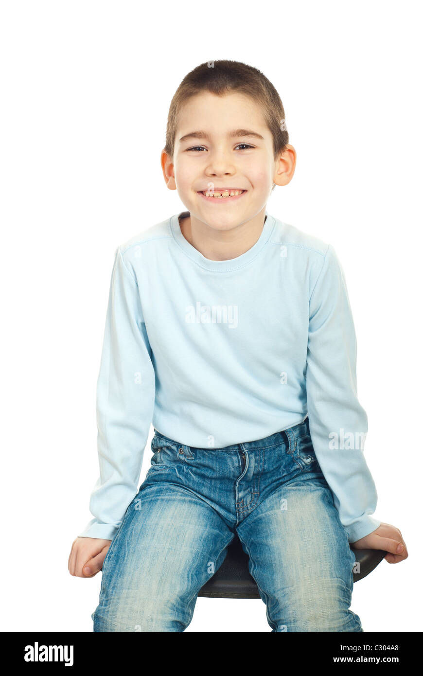 Happy boy sitting on chair isolated on white background Stock Photo - Alamy