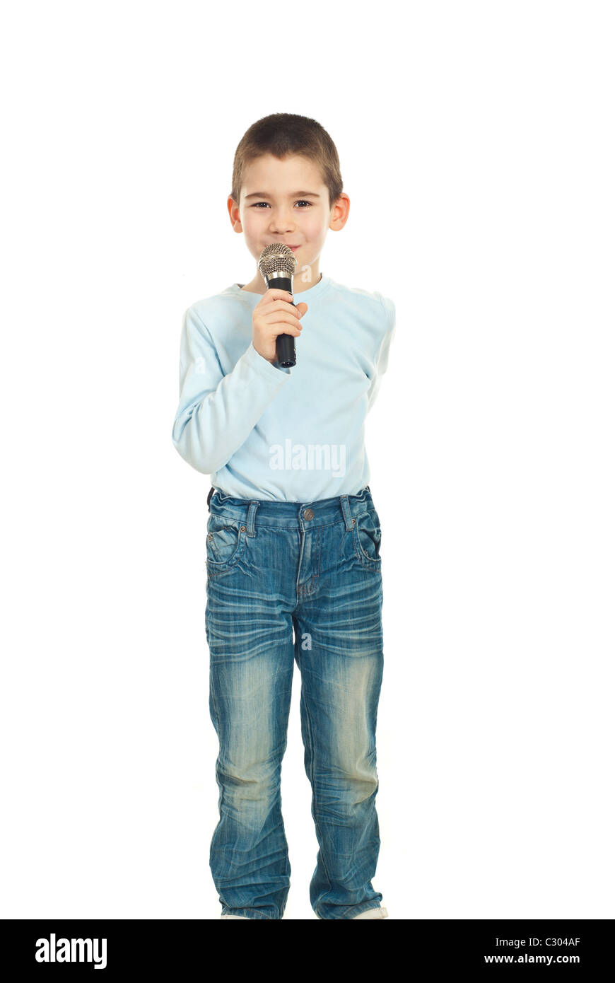 Shy boy singing to microphone isolated on white background Stock Photo ...