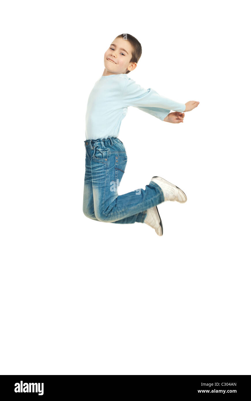 Happy kid boy jumping isolated on white background Stock Photo - Alamy
