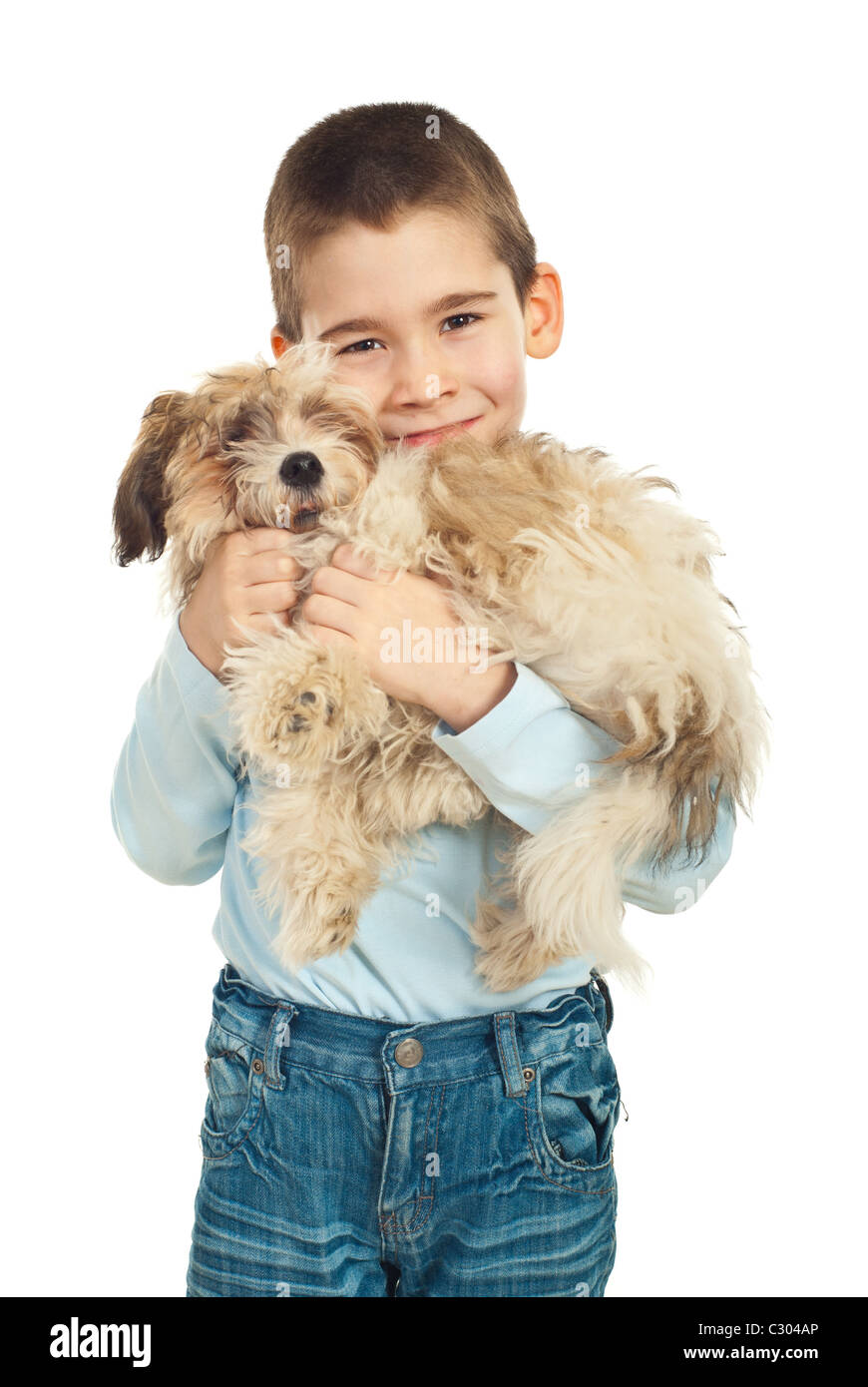 Boy loving and bonding his puppy fluffy dog over white background Stock ...