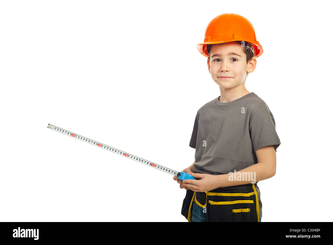 Confused funny boy holding ruler isolated on white background Stock ...