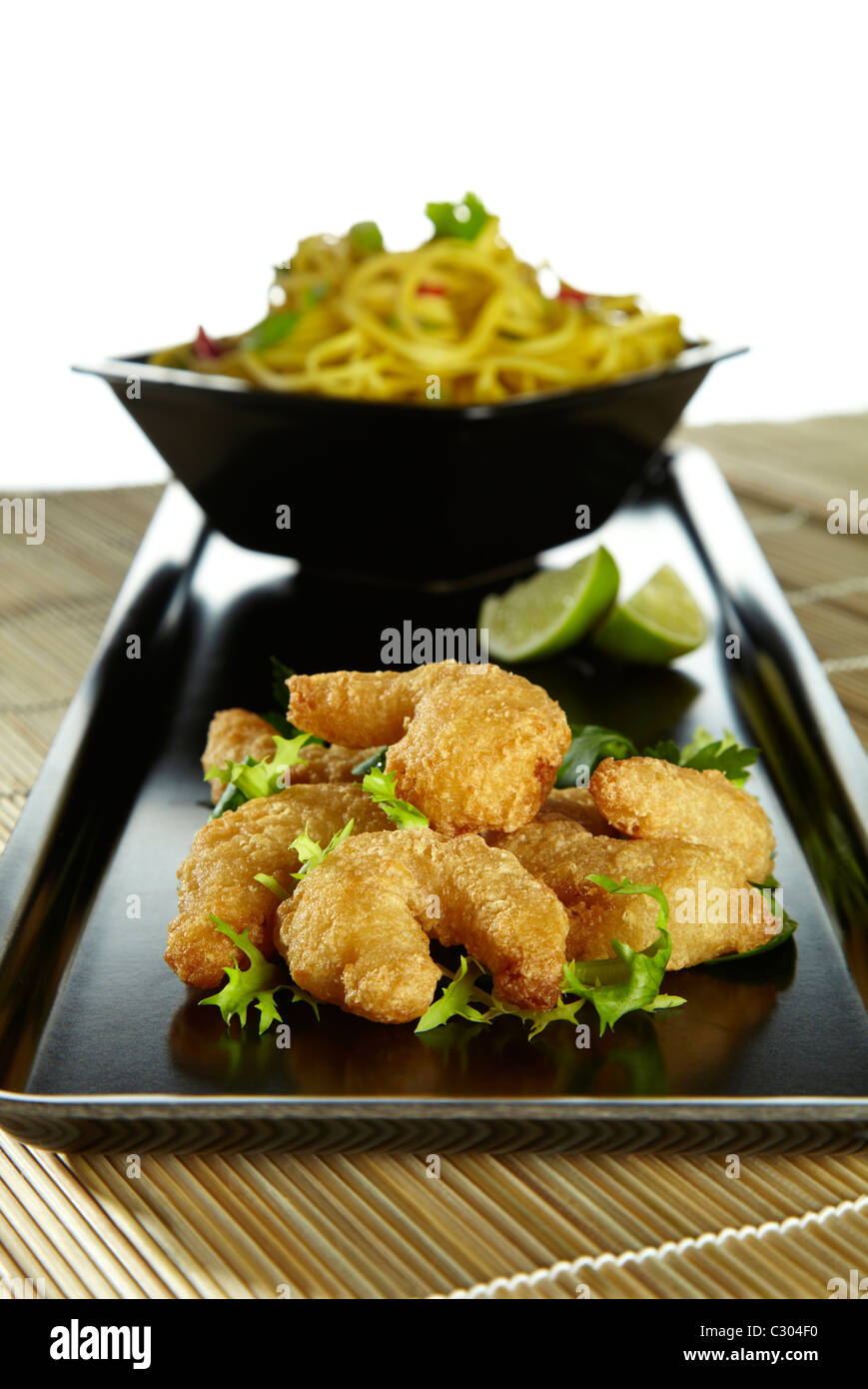 Deep fried prawns in crispy batter. The food photography is propped ...