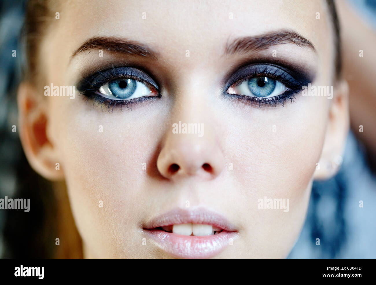 Face of gorgeous woman looking at camera Stock Photo - Alamy