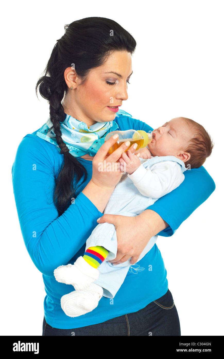 Mother giving tea to her newborn baby against white background Stock ...