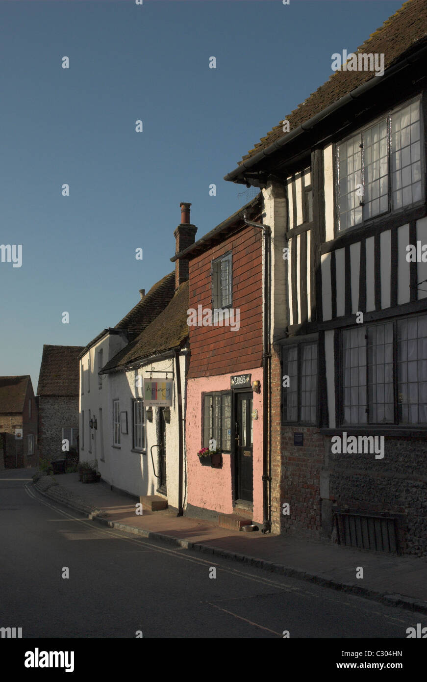 The high street tudor style buildings and shops hi-res stock ...