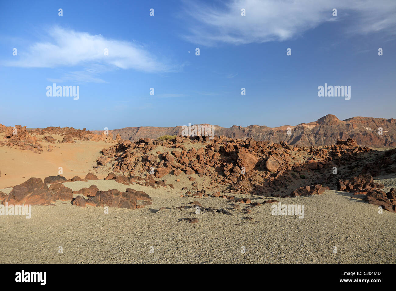 Volcanic desert at Tenerife Canary island. Blue sky, arid dry sand heat ...
