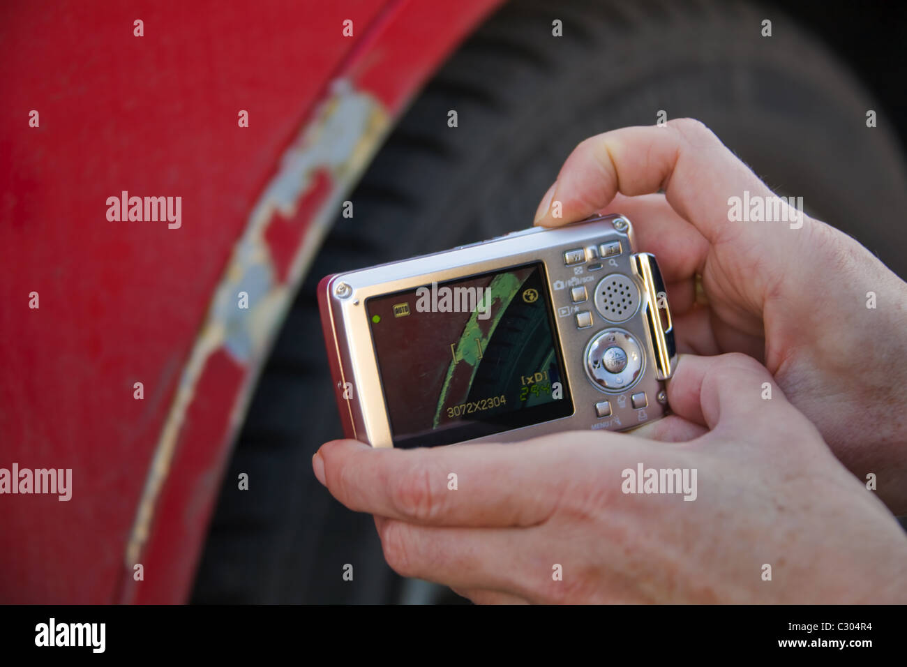 Expert at damage inspection Stock Photo - Alamy