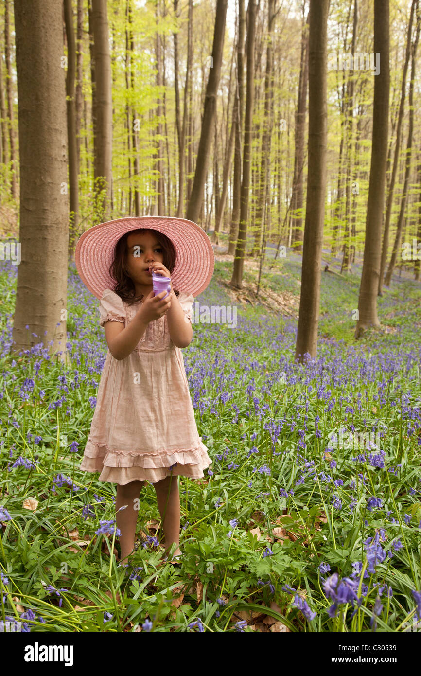 little girl making music in the woods Stock Photo - Alamy