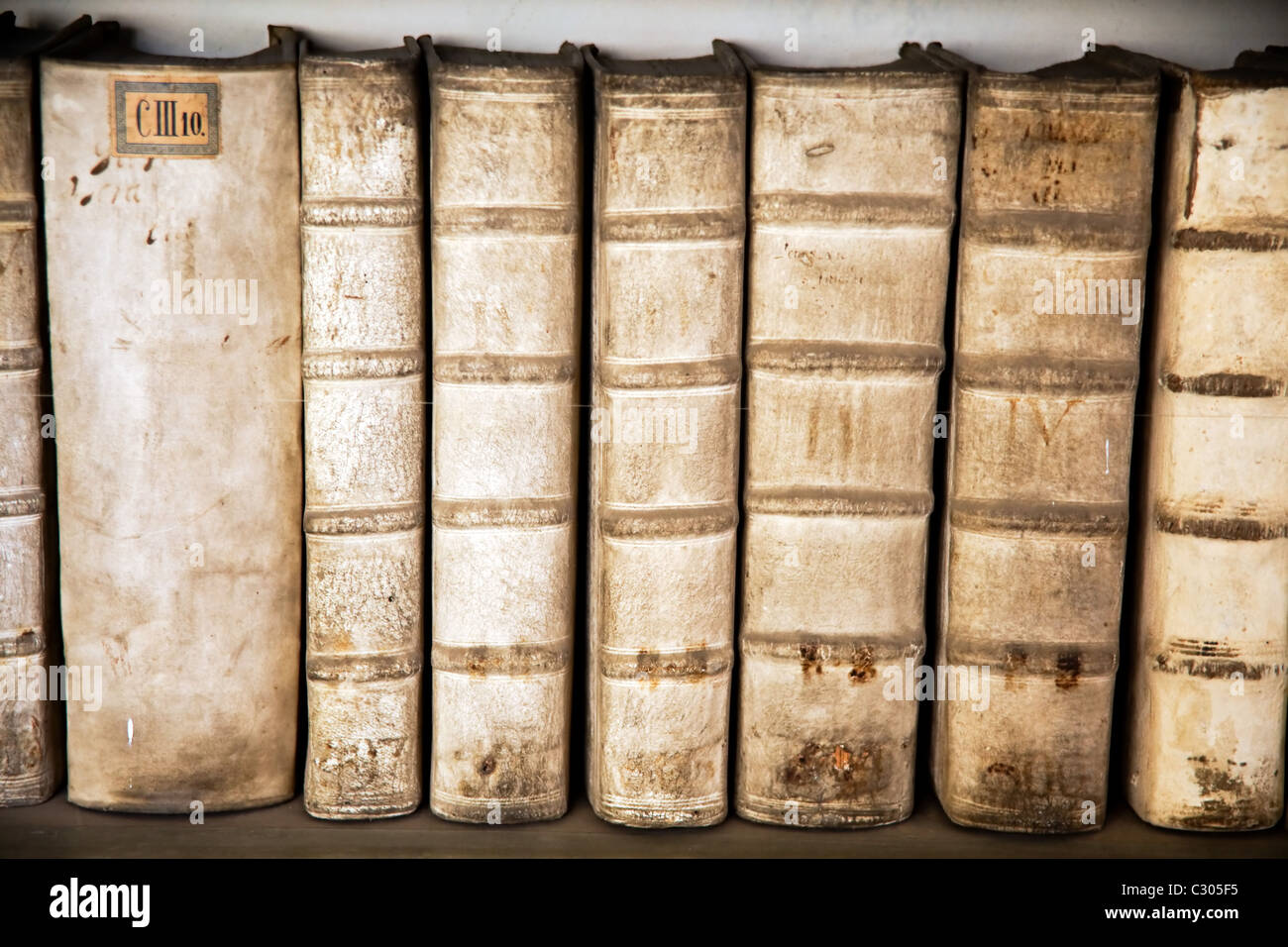 Old books in a library Stock Photo - Alamy