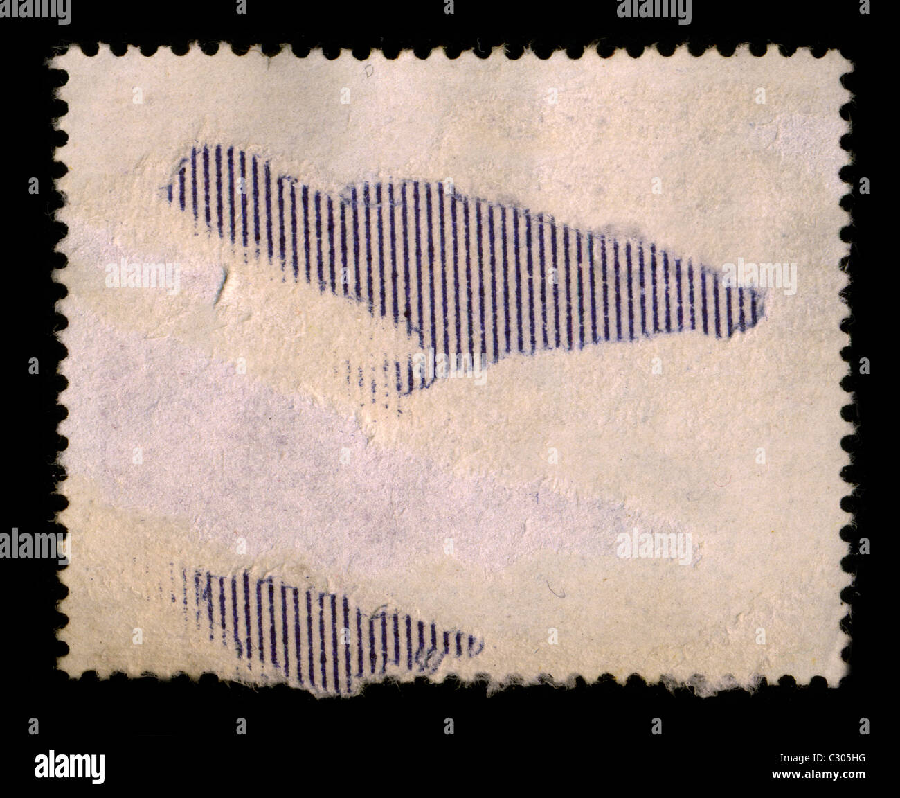 The reverse side of a postage stamp Stock Photo - Alamy