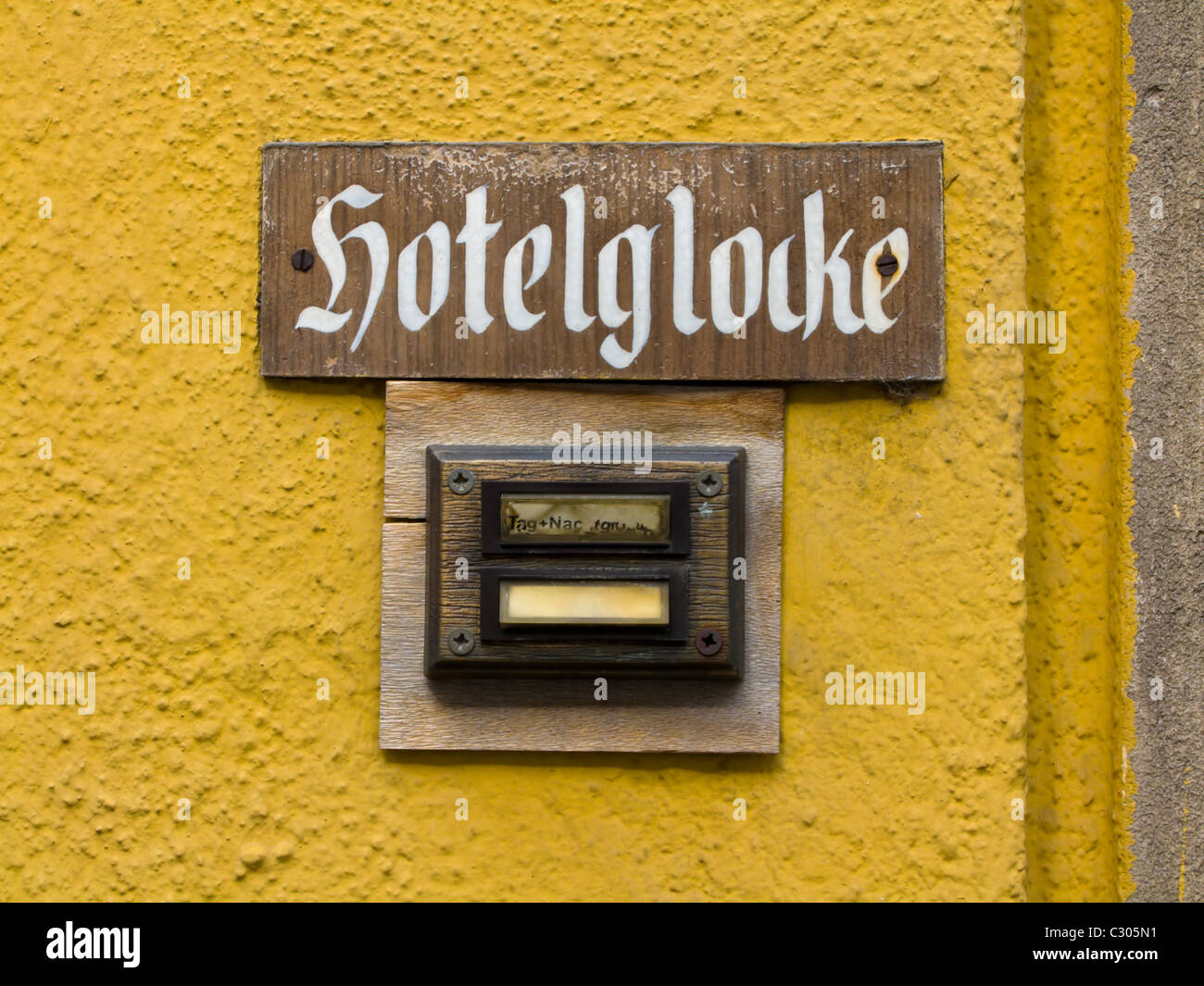 Night bell of a cheap and simple hotels Stock Photo - Alamy