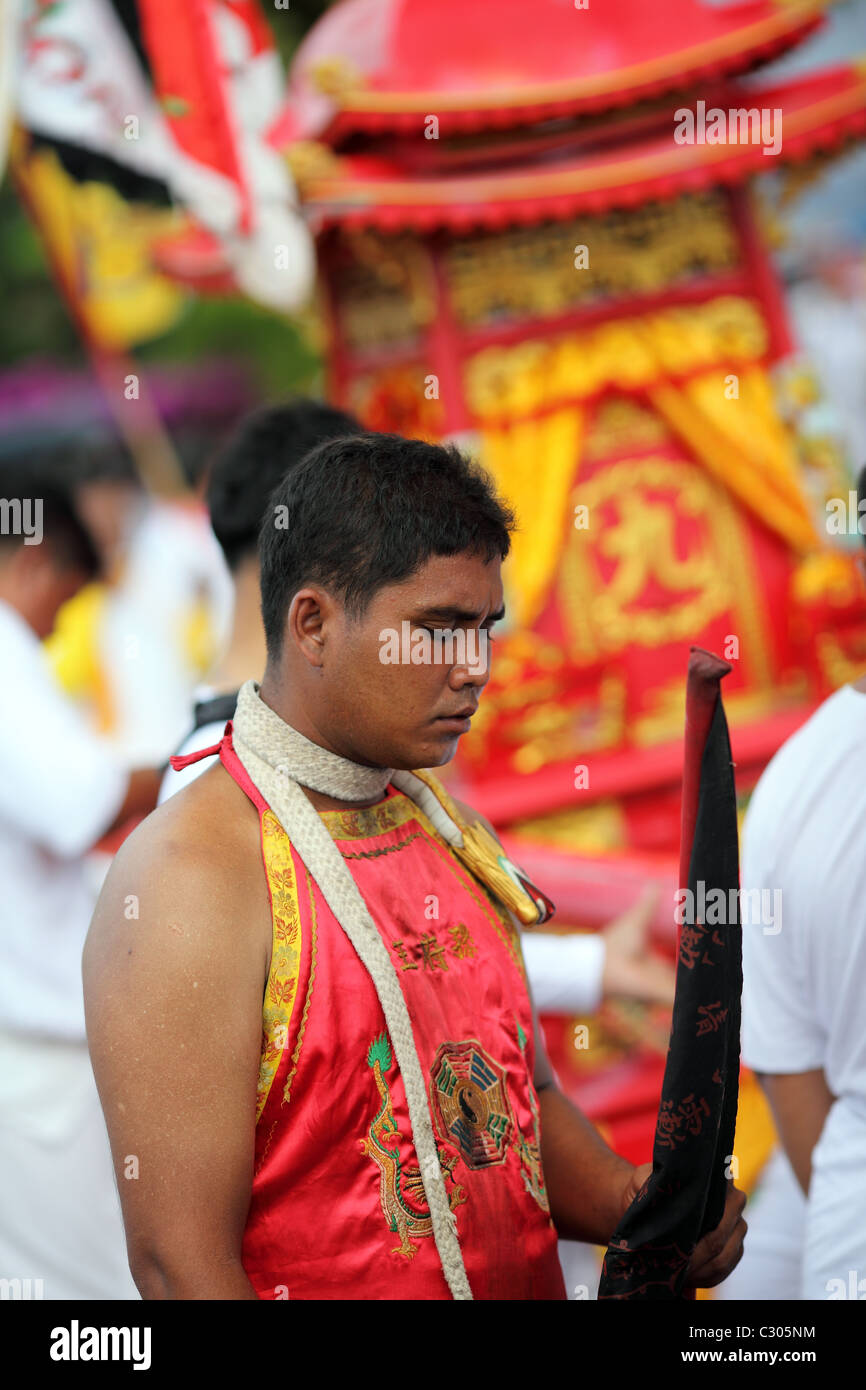 Spirit mediums pray during the Phuket Vegetarian Festival in Phuket ...