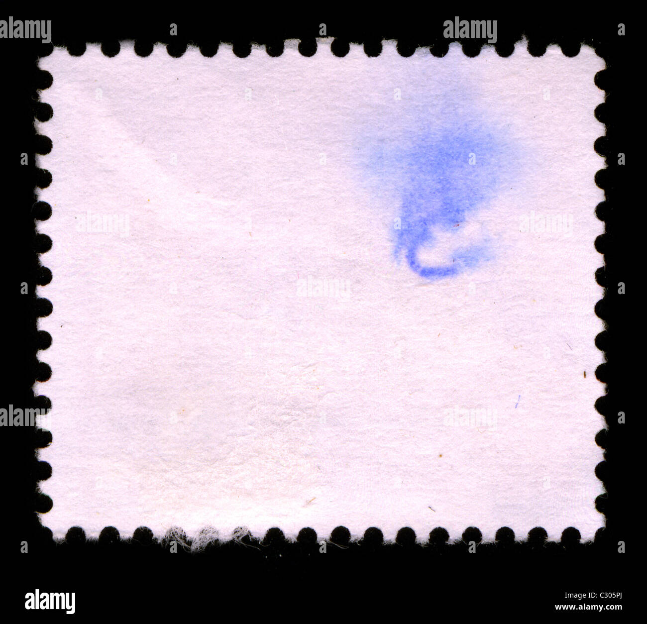 The reverse side of a postage stamp Stock Photo - Alamy