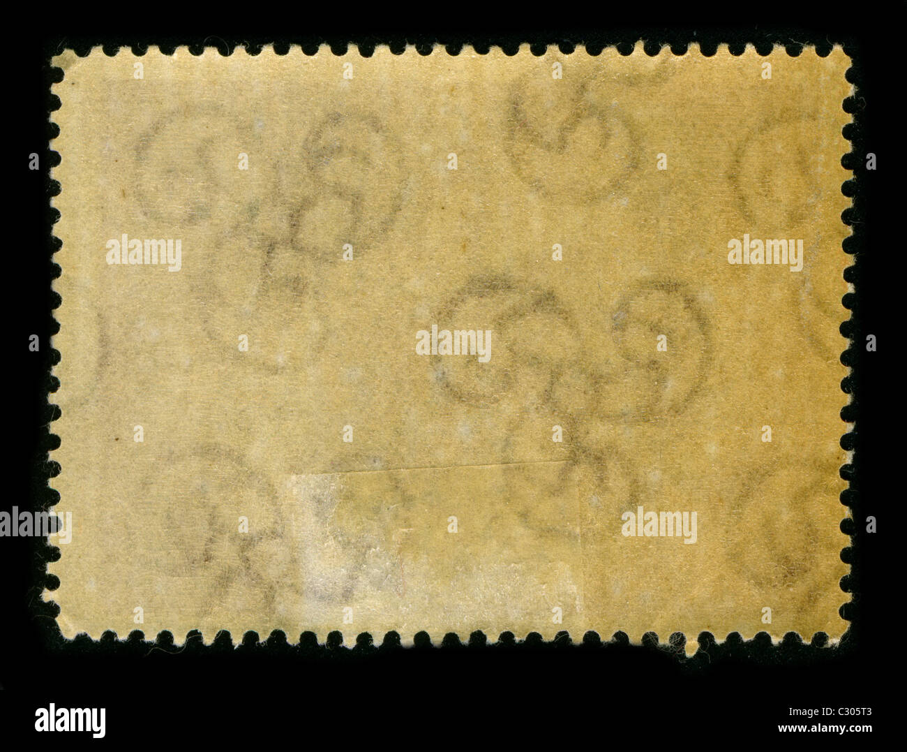 The reverse side of a postage stamp Stock Photo - Alamy