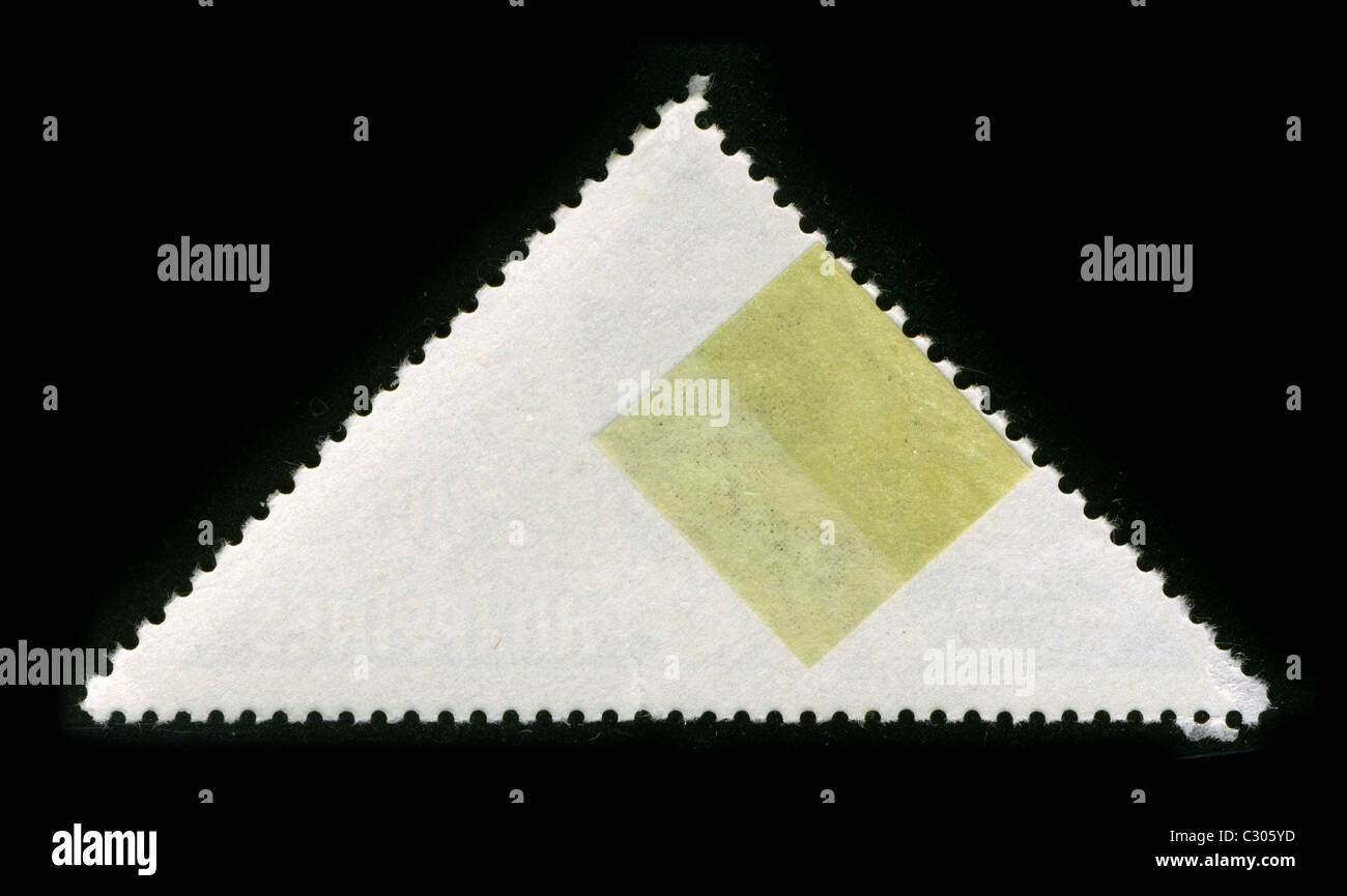 The reverse side of a triangle postage stamp Stock Photo - Alamy