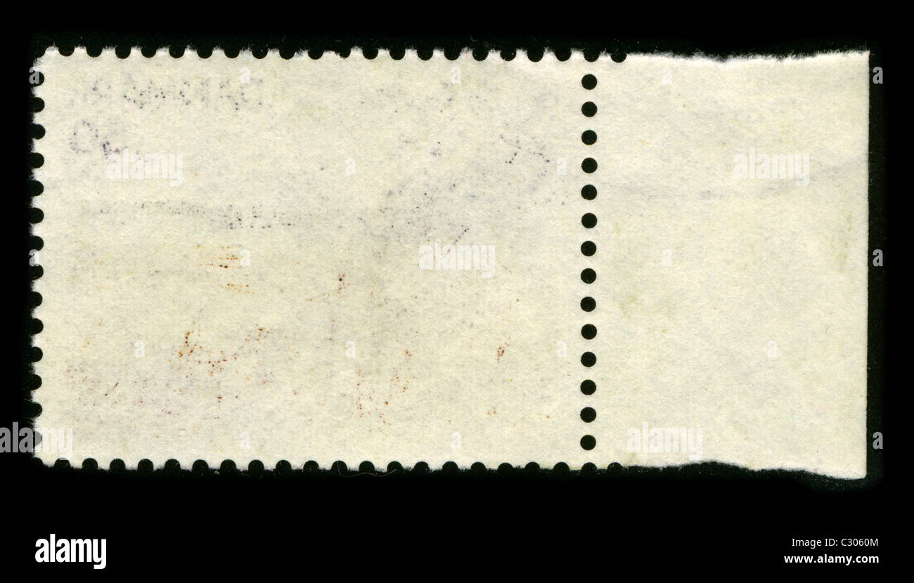 The reverse side of a postage stamp Stock Photo - Alamy