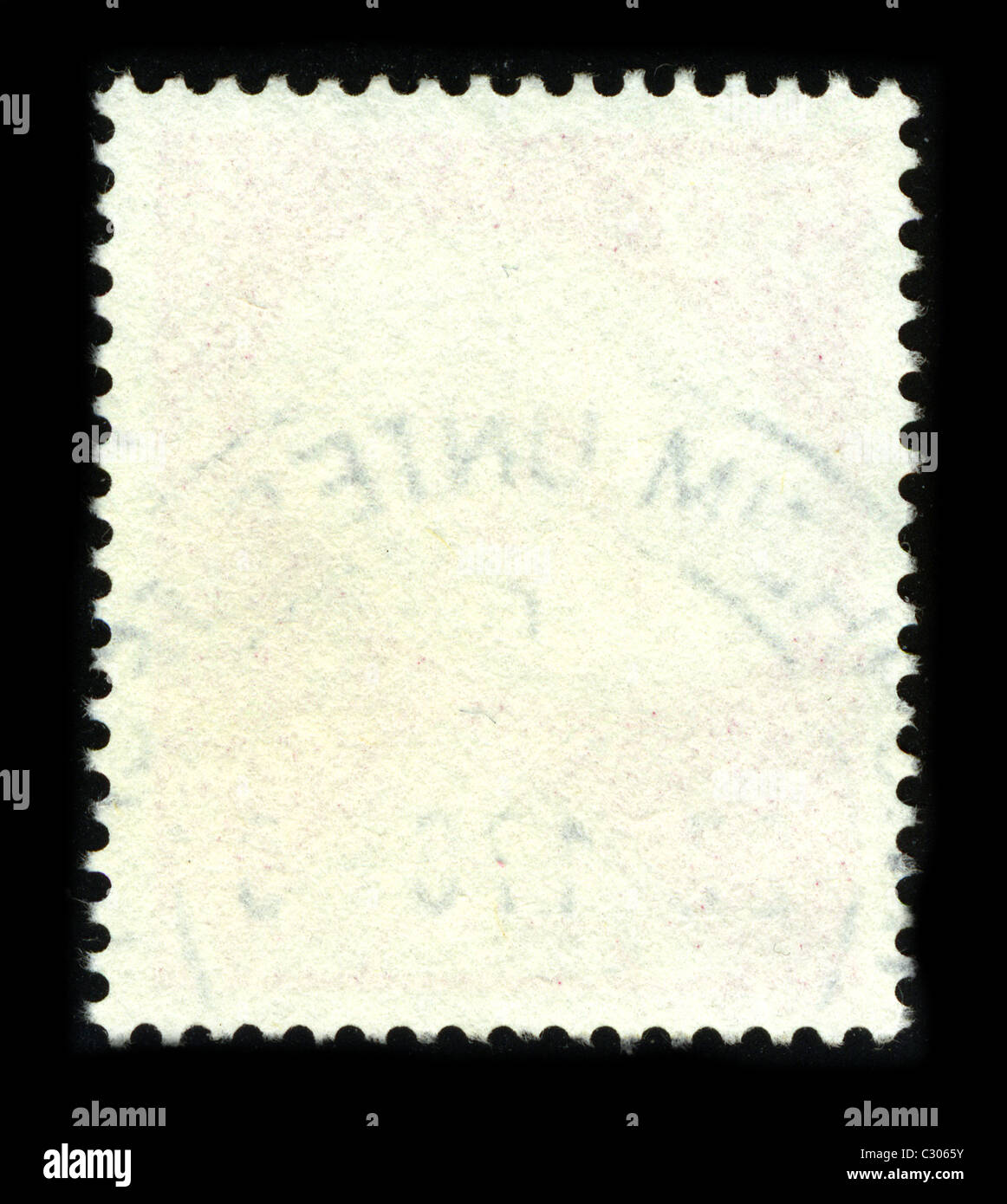 The reverse side of a postage stamp Stock Photo - Alamy