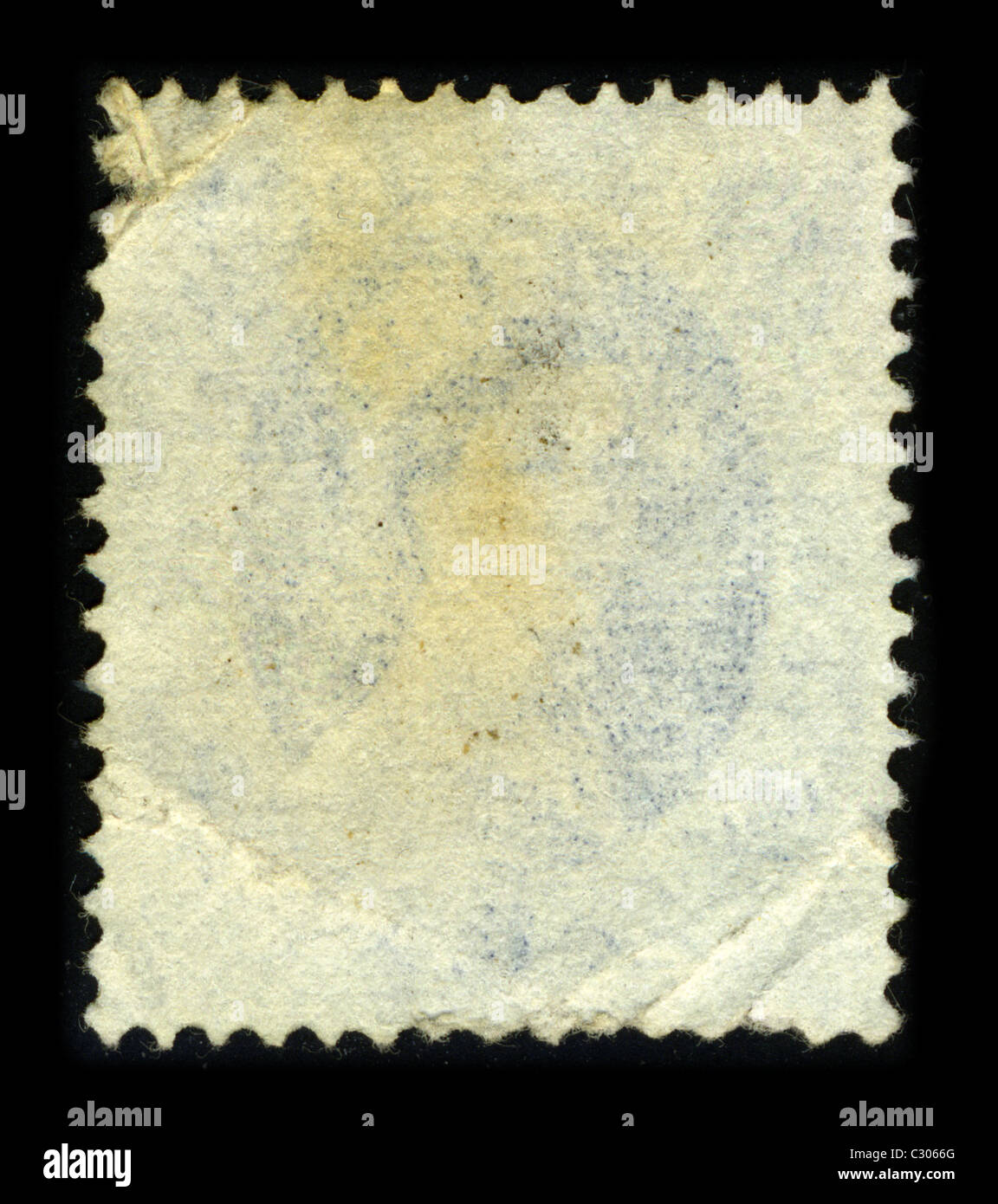 The reverse side of a postage stamp Stock Photo - Alamy