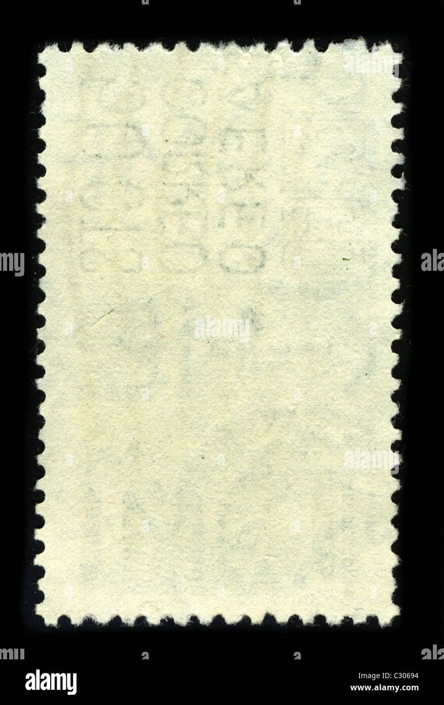 The reverse side of a postage stamp Stock Photo - Alamy