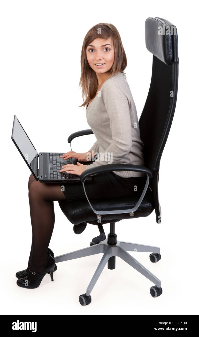 girl in a chair with a laptop isolated on white background Stock Photo ...