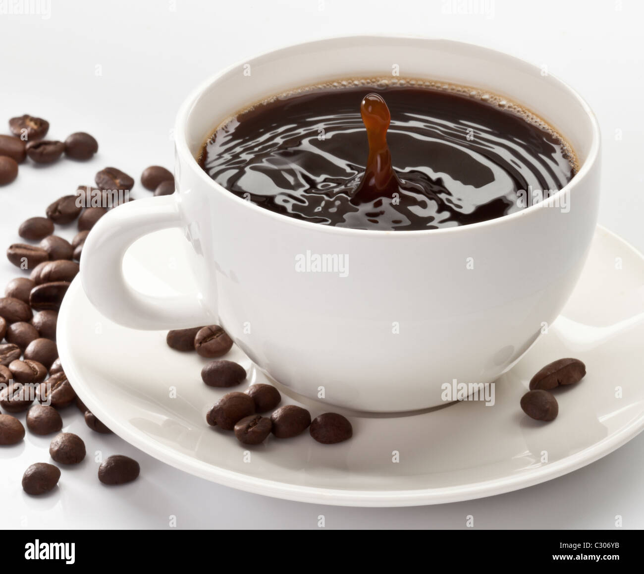 drop falling into a cup of coffee Stock Photo - Alamy