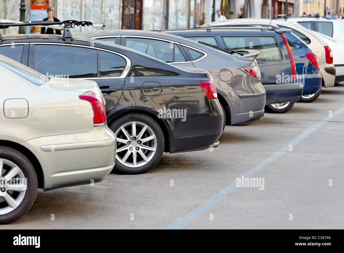 Parked cars in a parking lot Stock Photo - Alamy