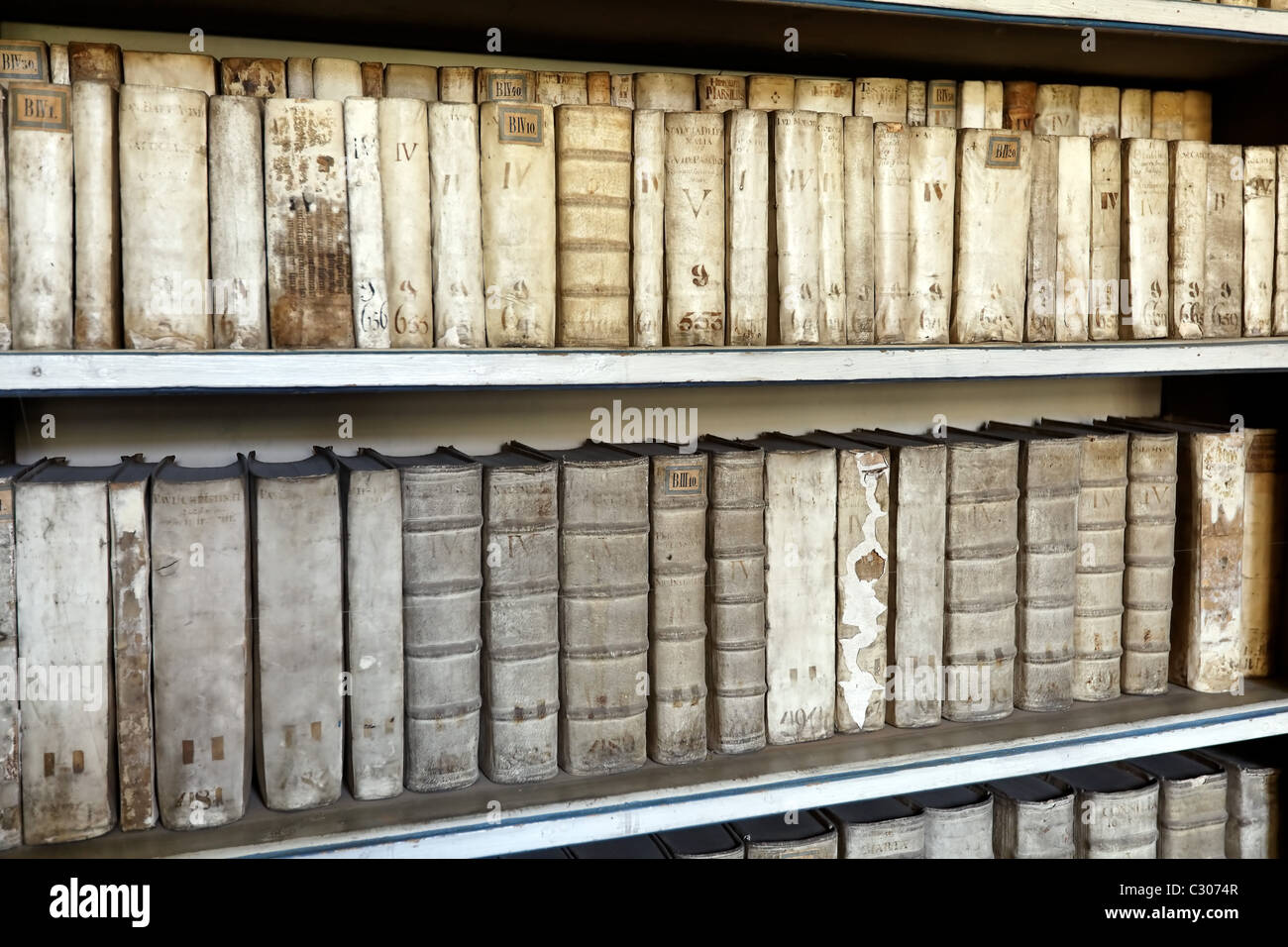 Old books in a library Stock Photo - Alamy