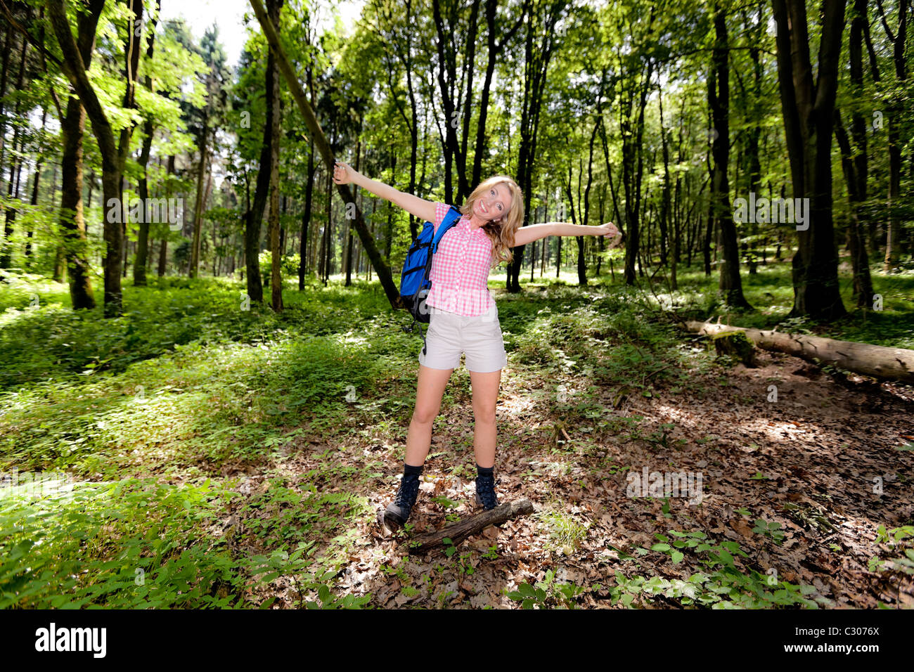 Woman in nature while hiking Stock Photo - Alamy