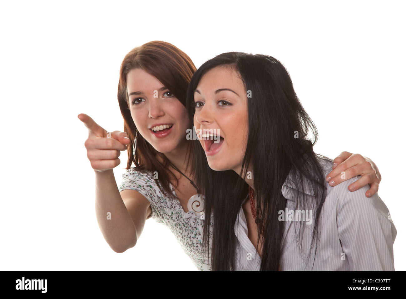 Two young women burst into laughter Stock Photo - Alamy