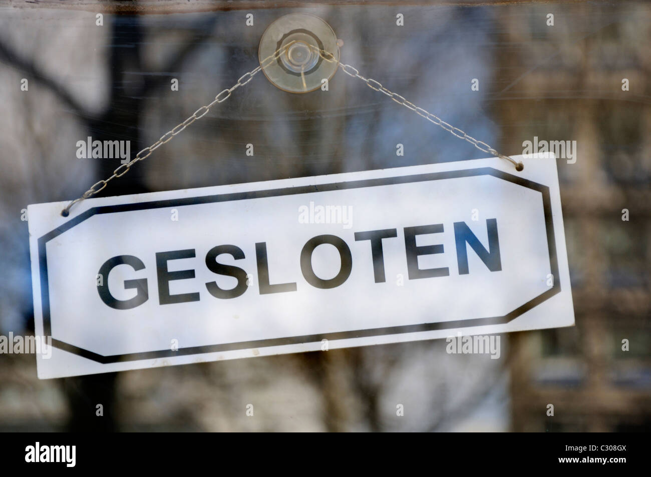 Rotterdam, Netherlands. Closed Sign 'Gesloten' inside shop window Stock ...