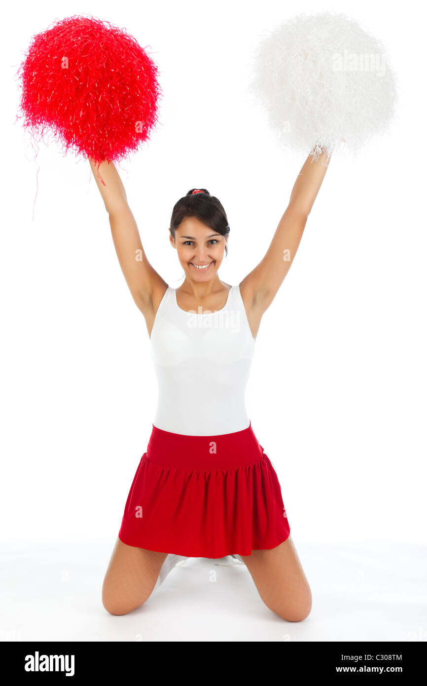Young lady cheerleader posing in the studio, isolated on white Stock ...