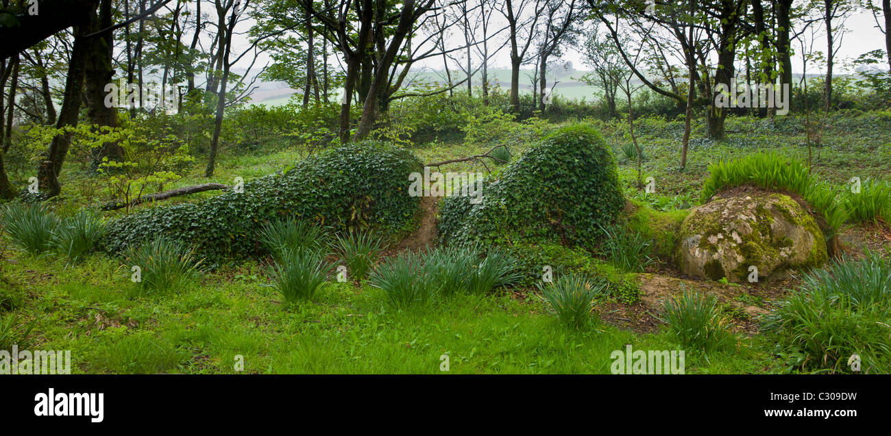 Mud Maid earth woman sculpture of stone and plants at the Lost Gardens ...