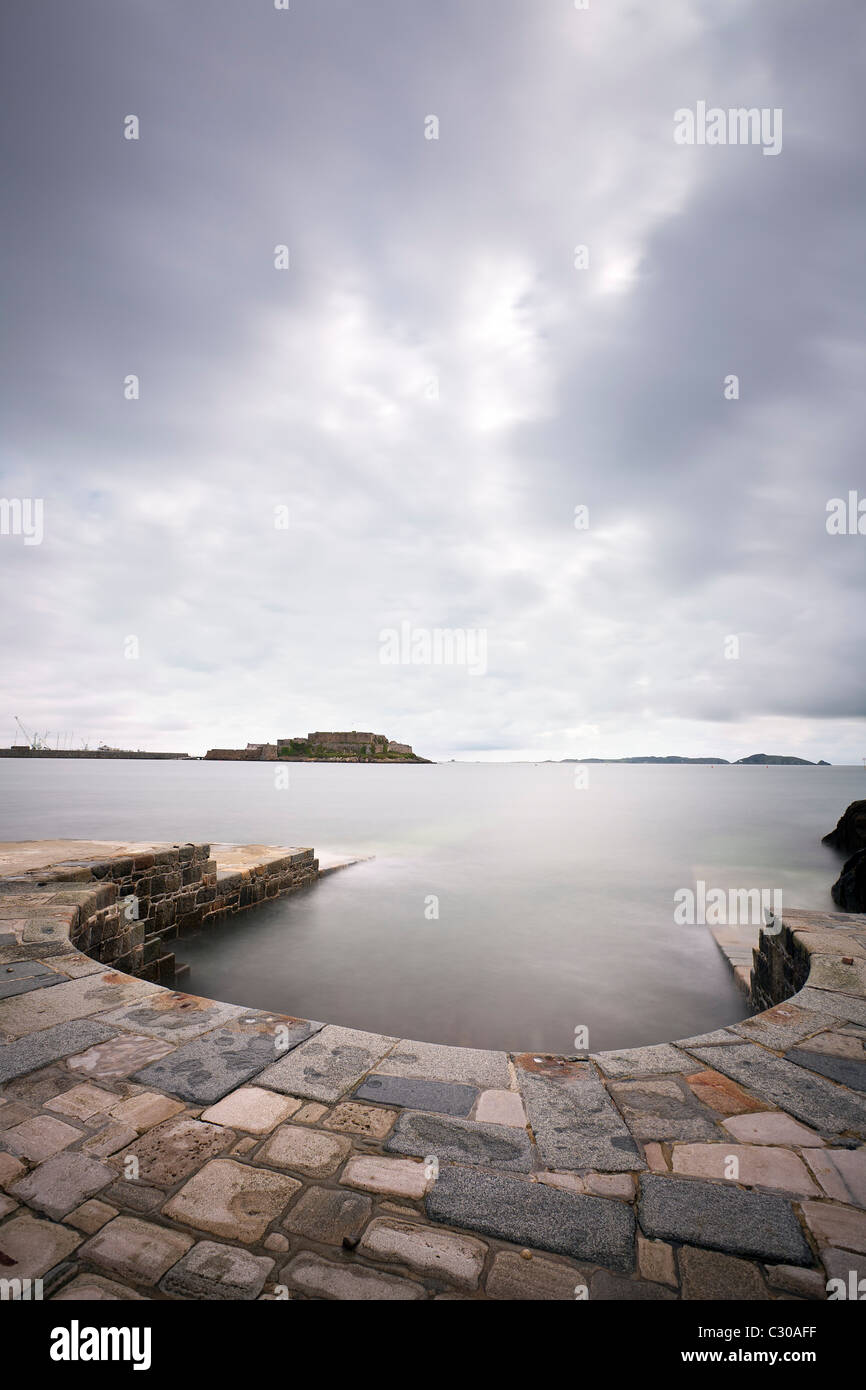 Horseshoe pool looking towards Castle Cornet, Havelet Bay, St Peter ...
