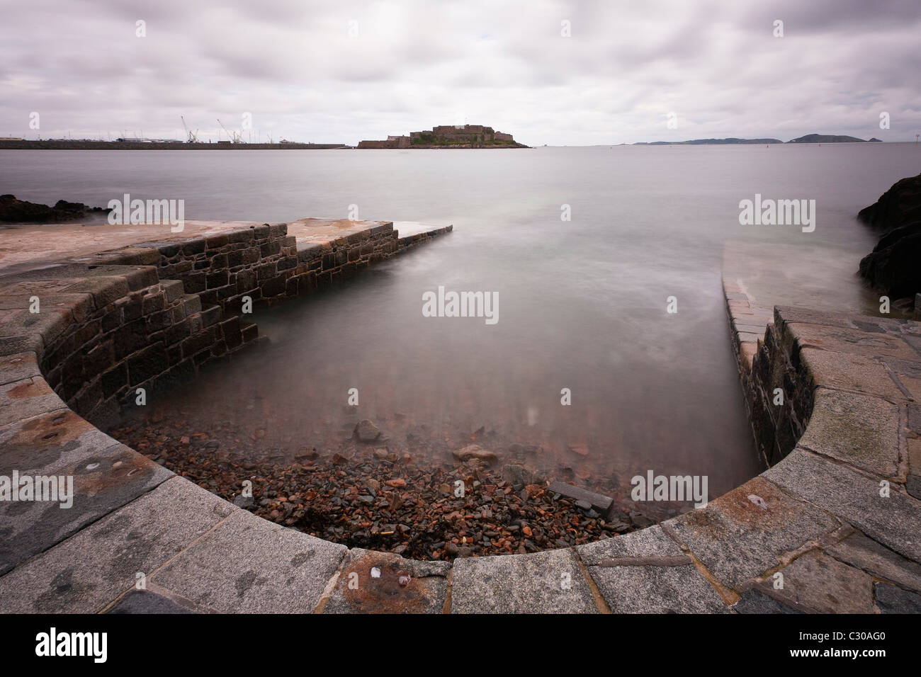 Horseshoe pool looking towards Castle Cornet, Havelet Bay, St Peter ...