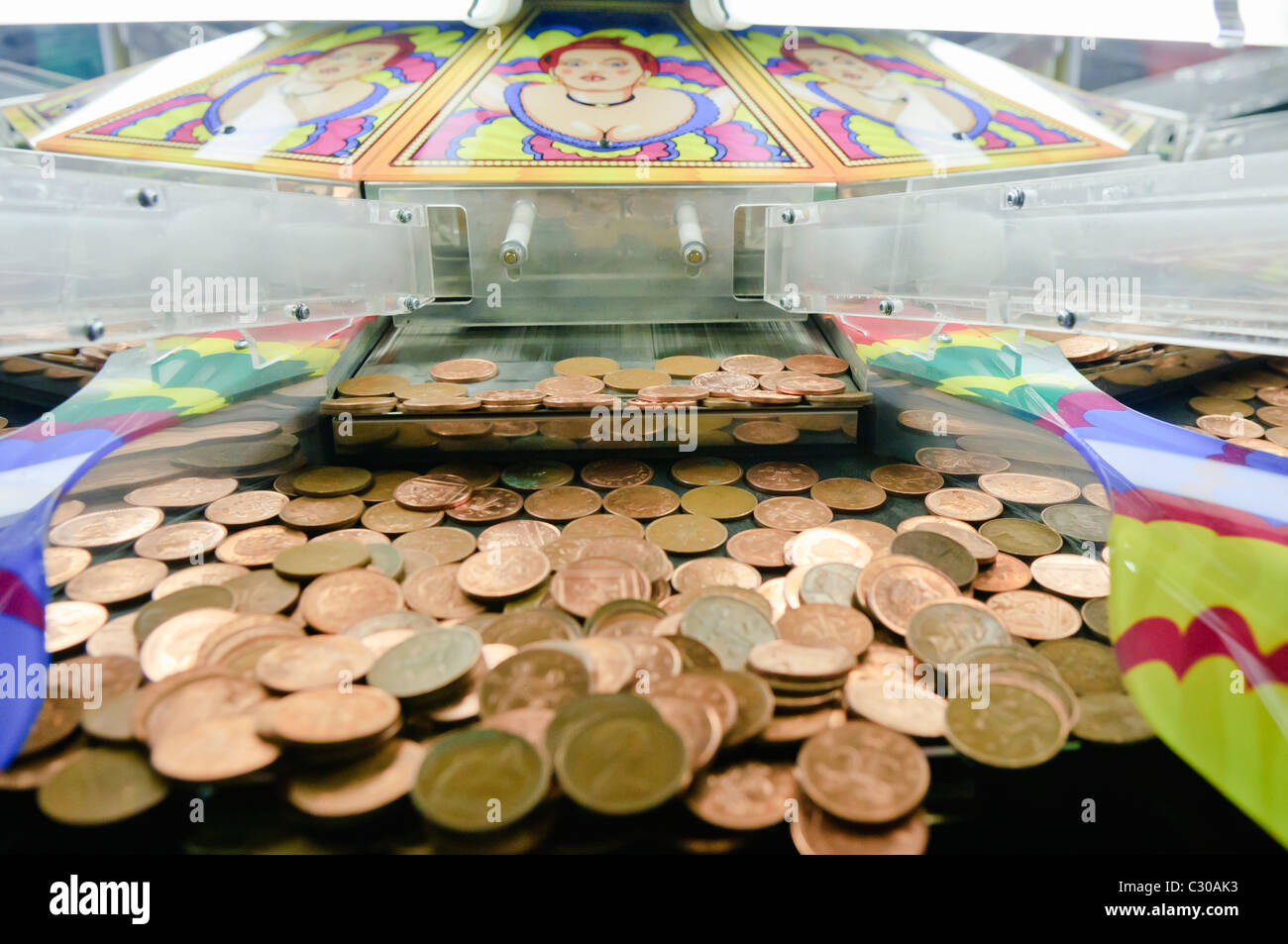 Penny machine hi-res stock photography and images - Alamy