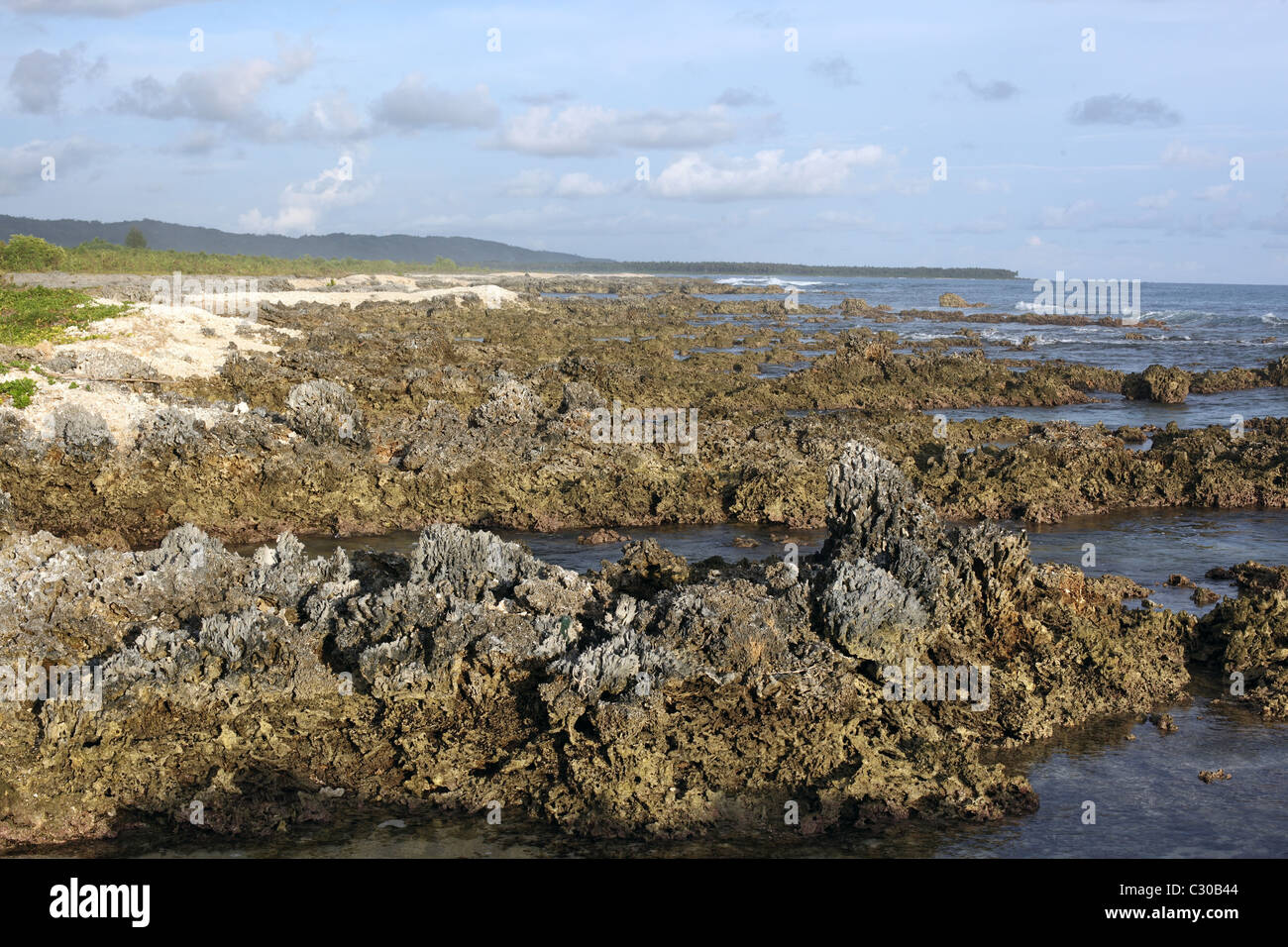 Sharp volcanic reef in Afulu, permanently exposed after the March 2005 ...