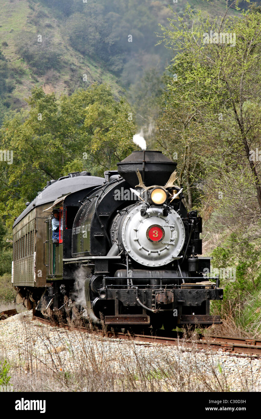 The Robert Dollar Co. steam engine #3 pulls a passenger train through ...