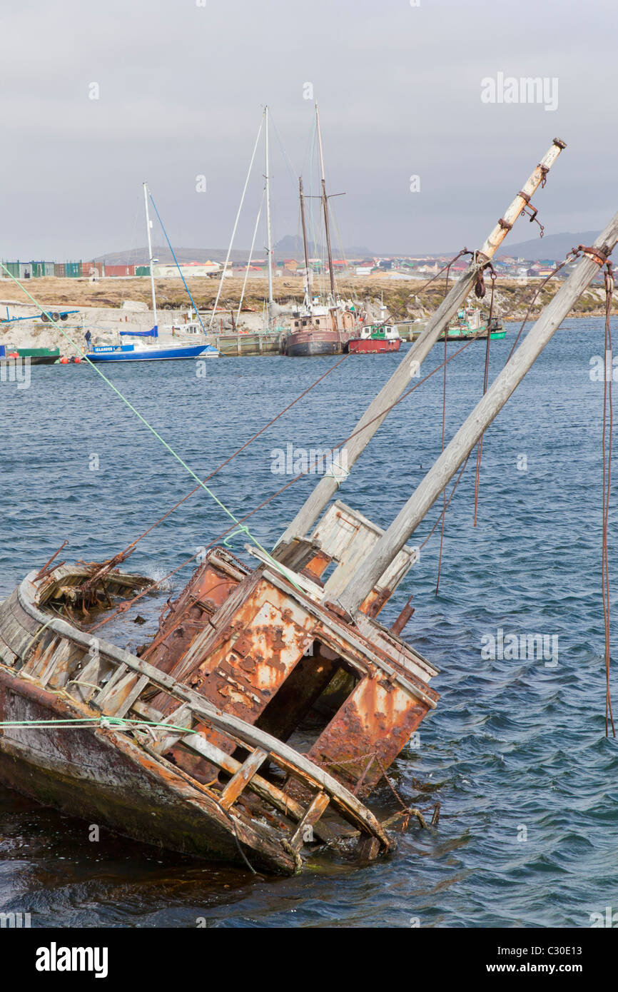 Partly submerged and rusting shipwreck in Port Stanley, East Falklands ...