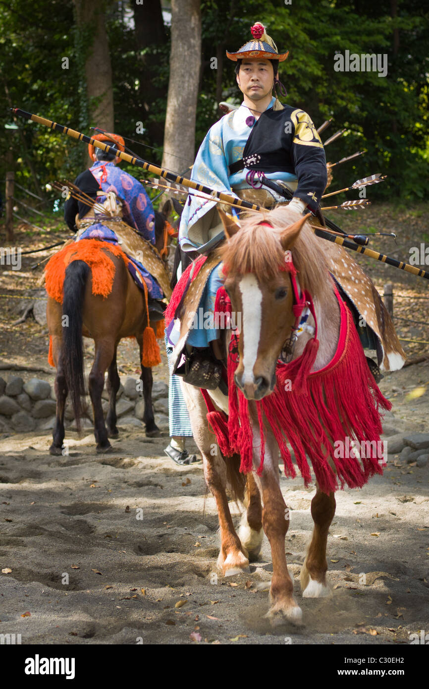 An Archer in Ancient Samurai Costume during a Horseback archery ...