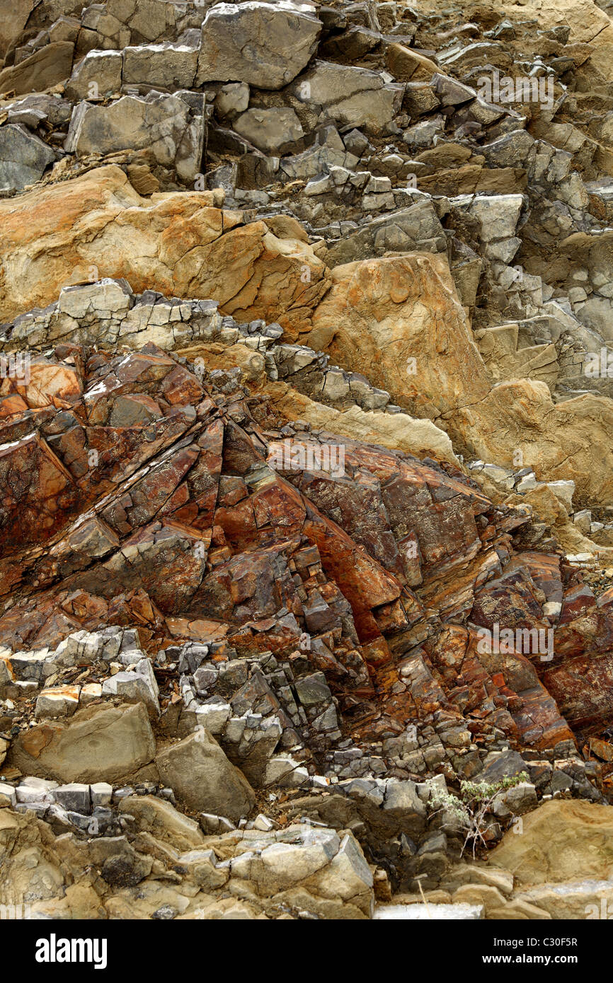 Stone faces of a cutout on a mountain pass Stock Photo - Alamy