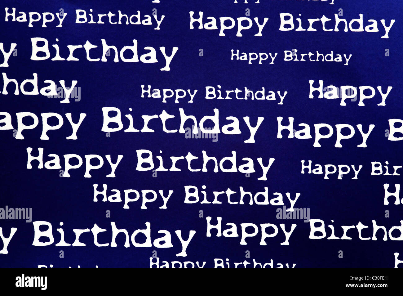 Happy Birthday writing on blue background Stock Photo - Alamy