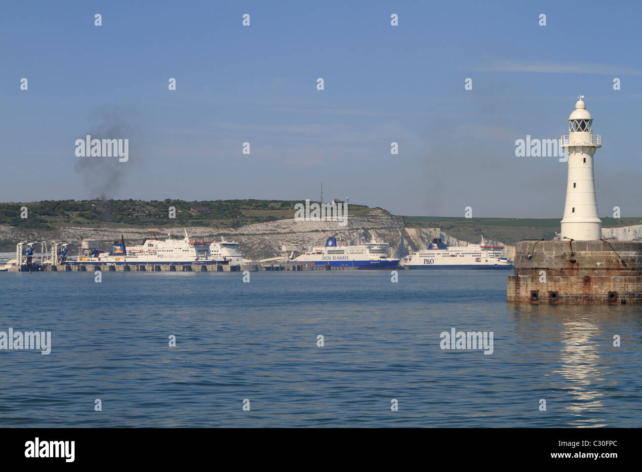 Ferries with smoke coming from their funnels in Dover Harbour Stock ...