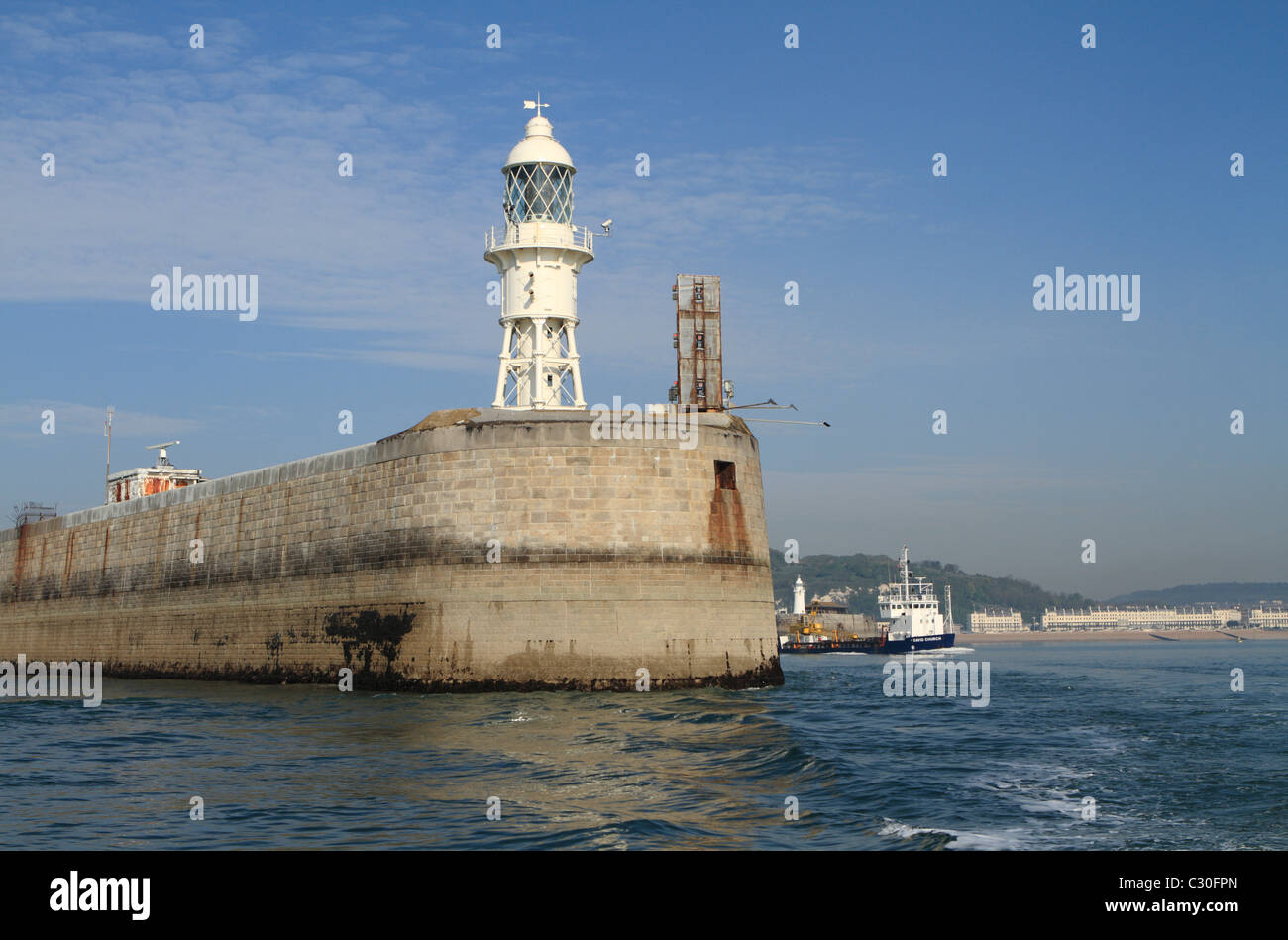 Dover Harbour Western entrance with the dredger David Church emerging ...