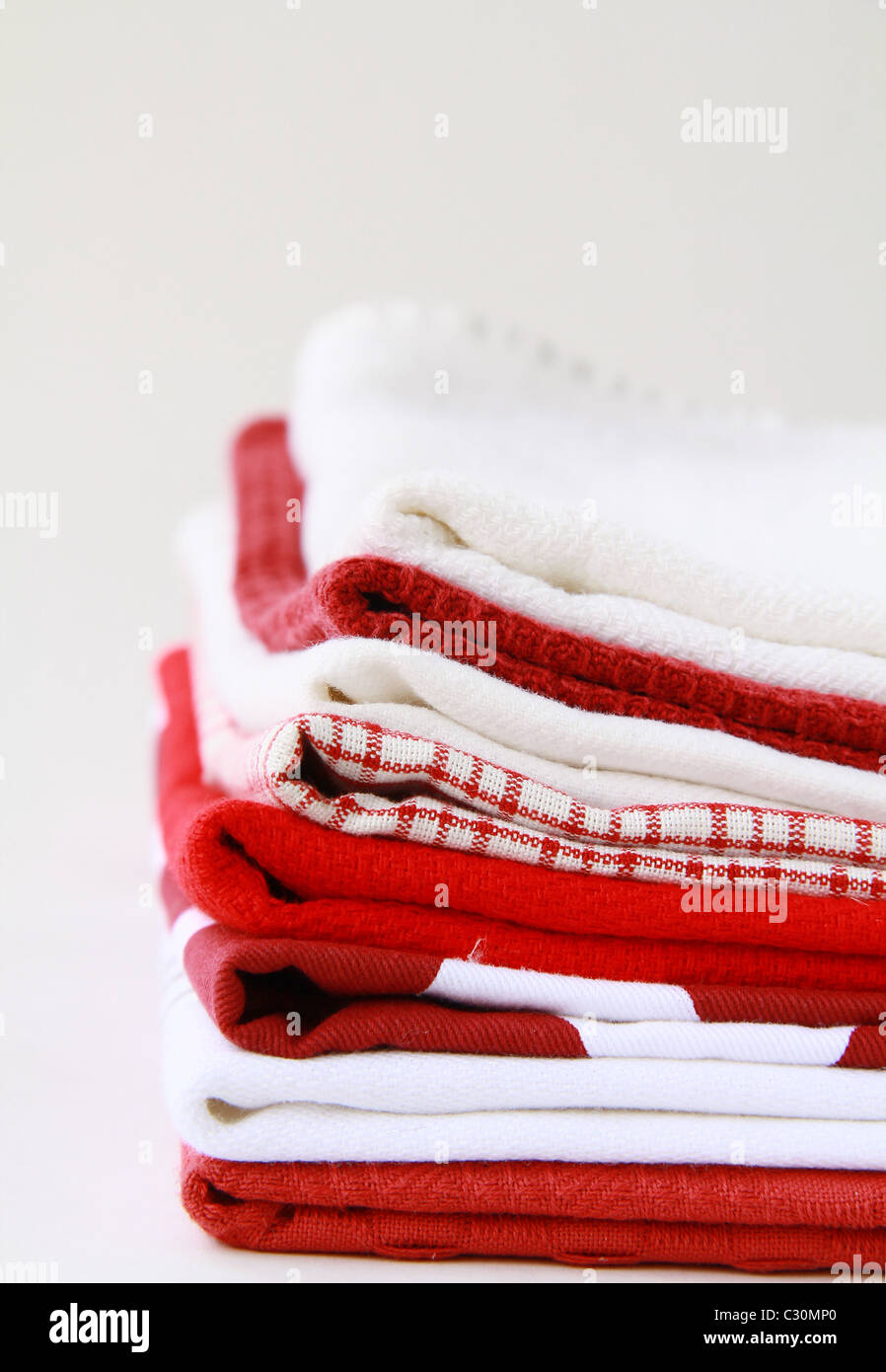 Pile of linen kitchen towels with space for your text Stock Photo - Alamy