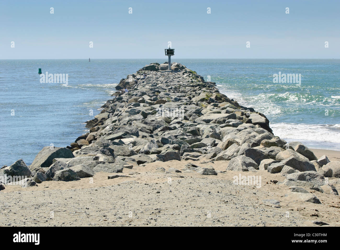 Rock jetty located in Moss Landing State Beach Stock Photo - Alamy