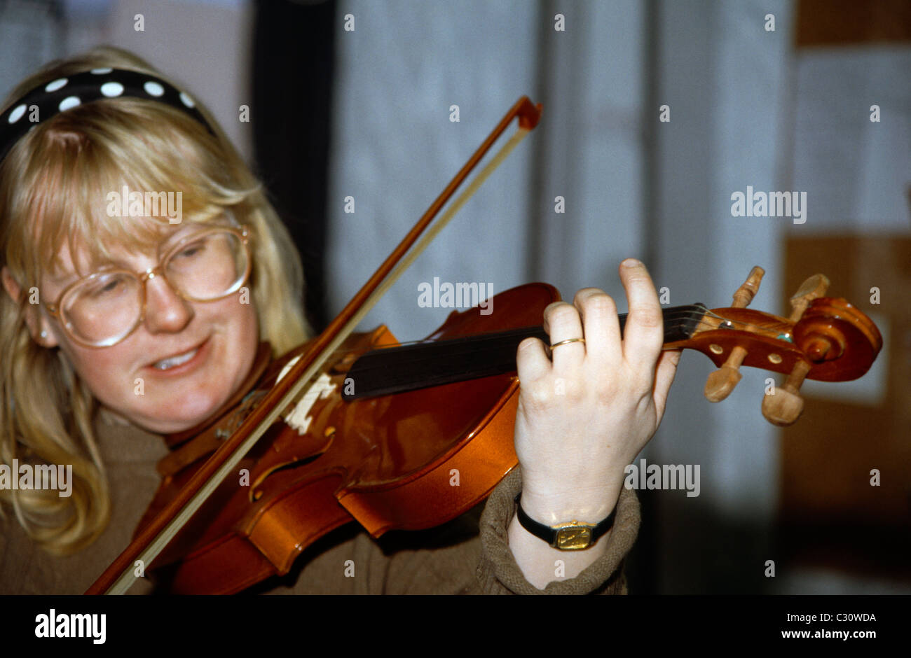 Bowing Strings Of Violin Stock Photo - Alamy