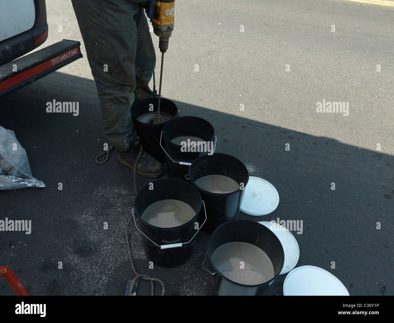 Man Mixing Epoxy Resin (Polyepoxide) Used To Protect Electrical ...