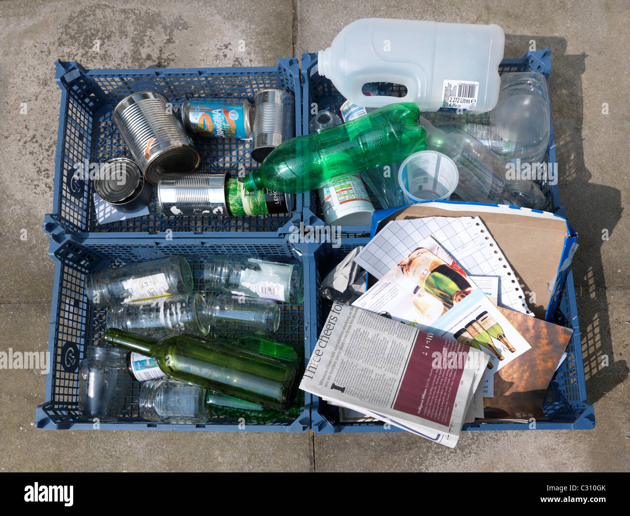 Domestic Recycling Divided Into Grouping Tins, Plastics, Glass And ...