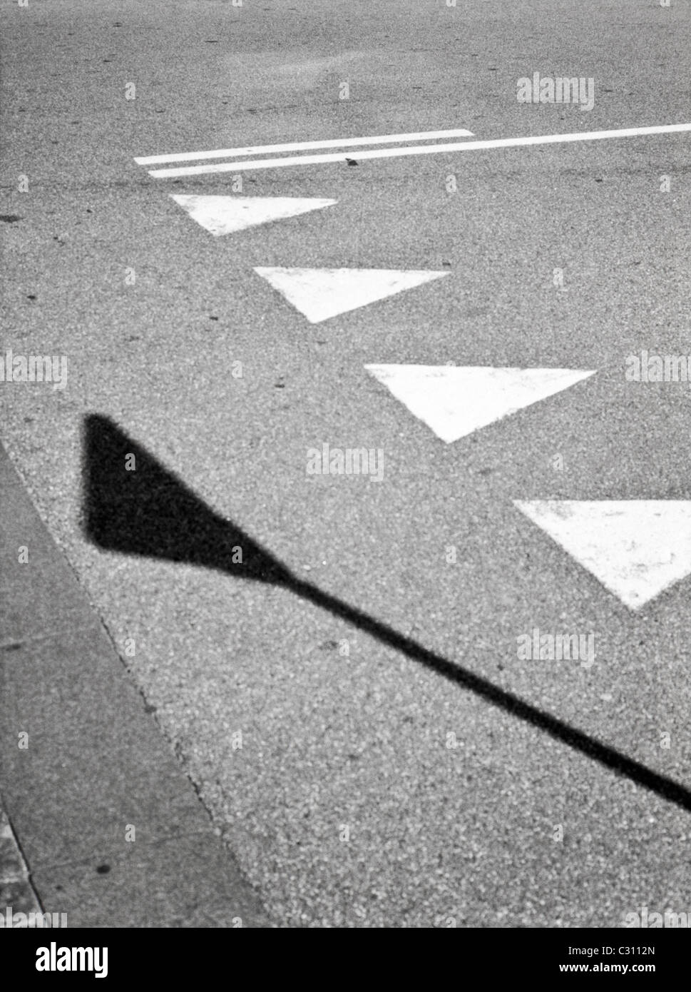Give way marking on tarmac road surface in Bergen, Norway Stock Photo ...