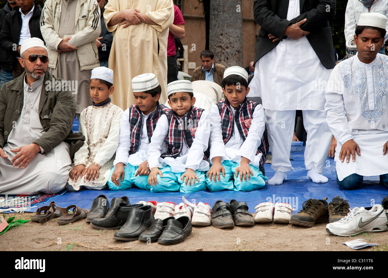 Rome, Italy - April 22, 2011 - Muslim people gathered for praying Stock ...